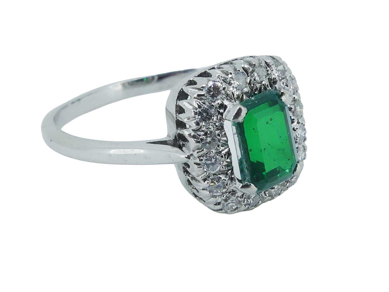 Lot 85 - Emerald Doublet and Diamond Ring.